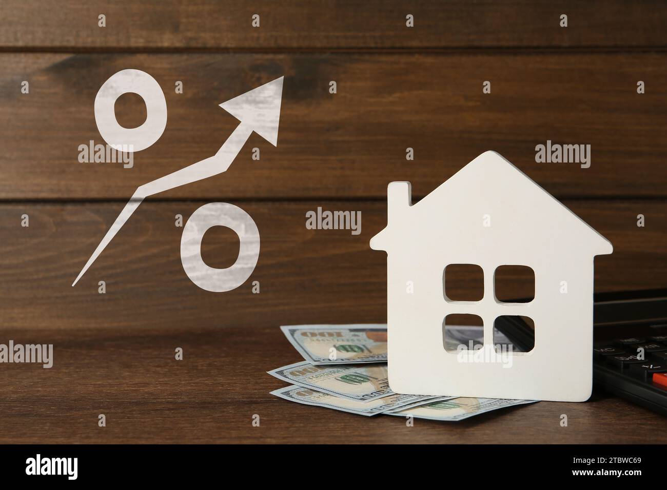 Mortgage rate rising illustrated by percent sign with upward arrow ...