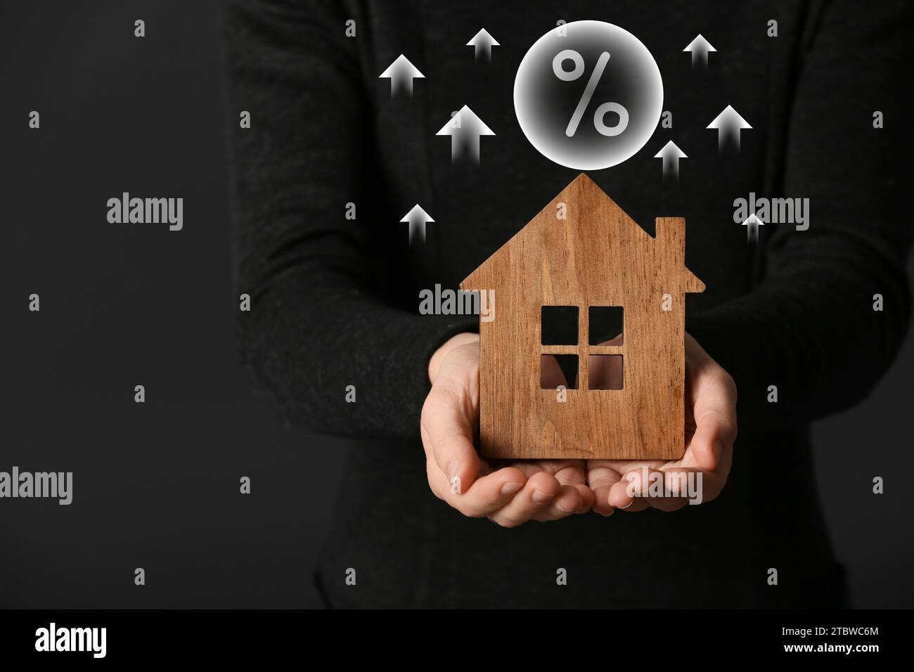 Mortgage rate rising illustrated by upward arrows and percent sign ...