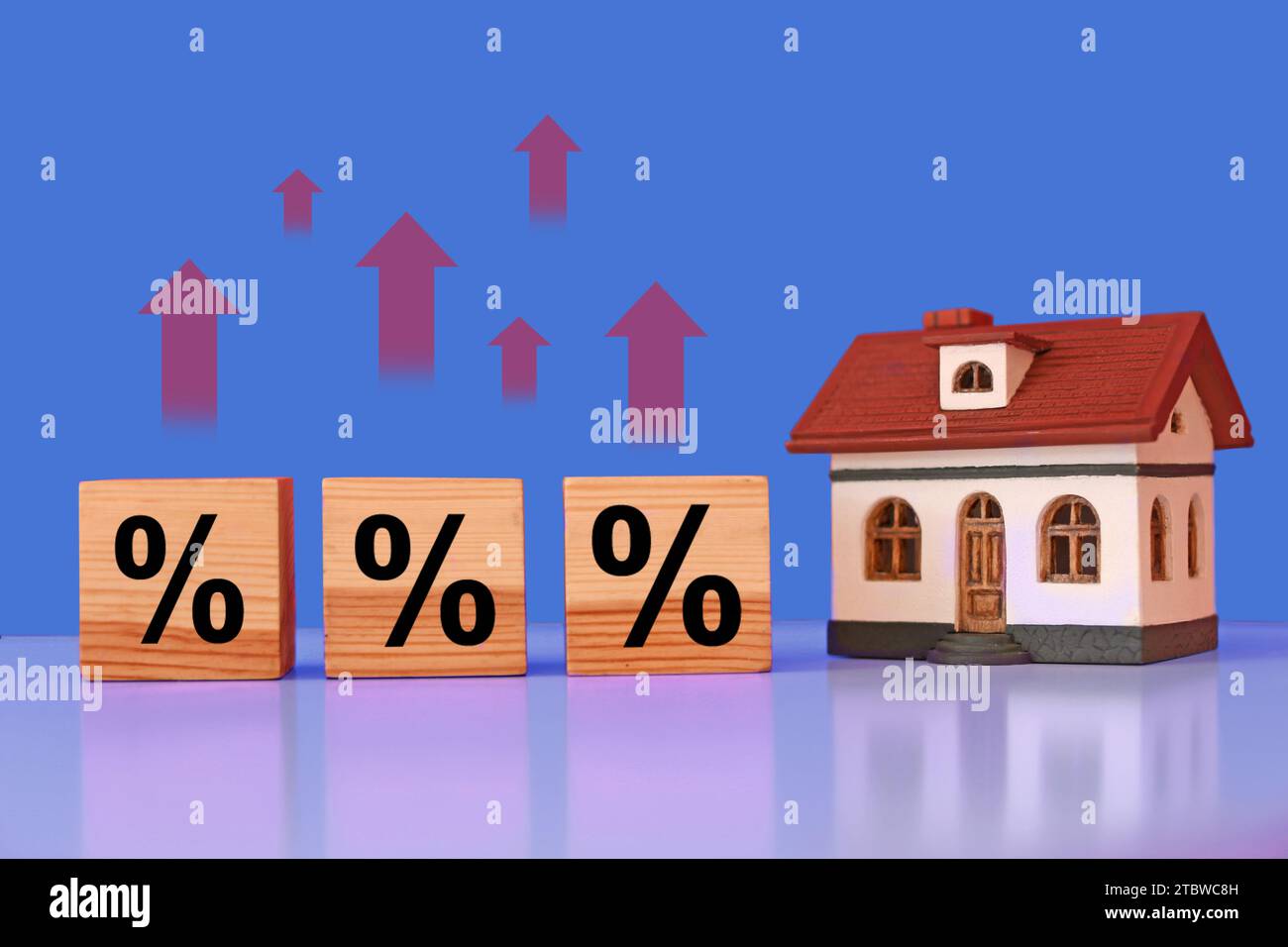 Mortgage rate rising illustrated by upward arrows and percent signs ...