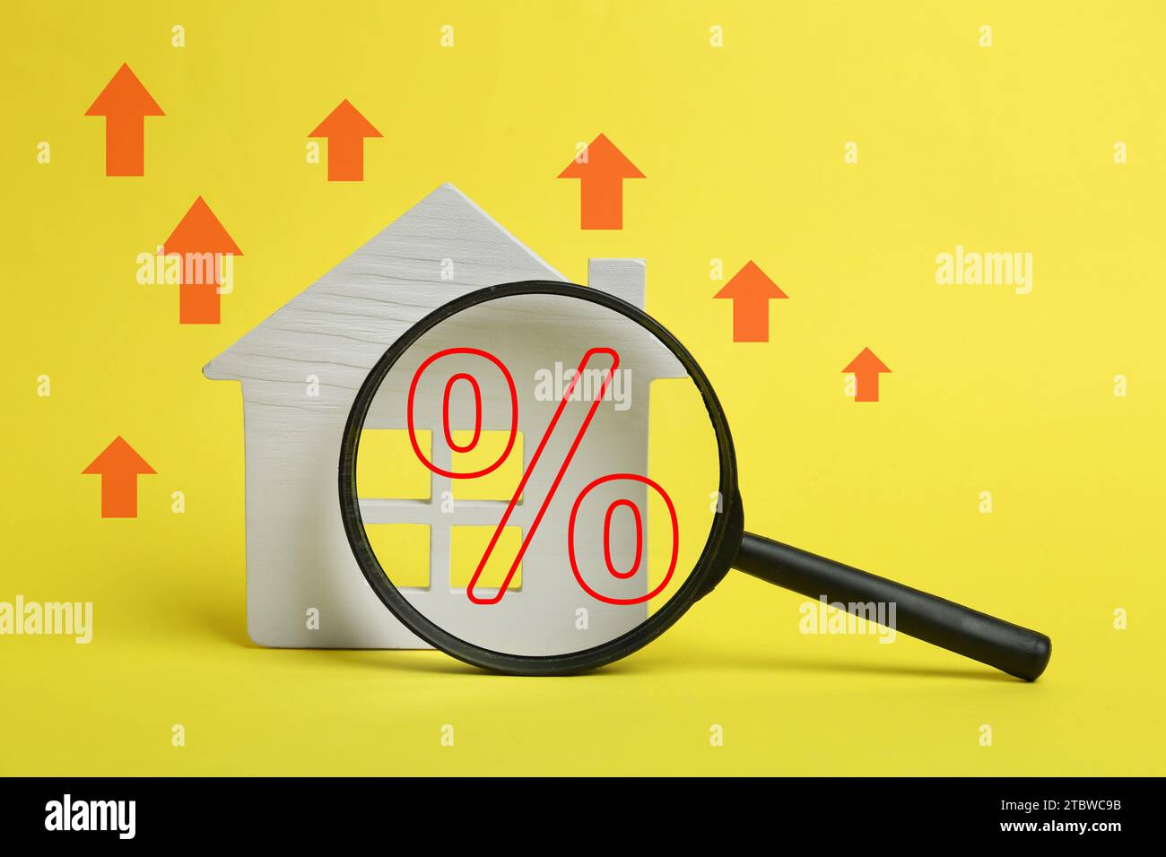 Mortgage rate rising illustrated by upward arrows and percent sign ...