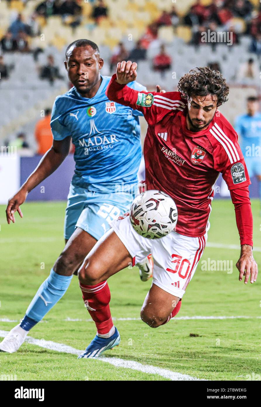 Alexandria, Egypt. 8th Dec, 2023. Mohamed Hany (R) of Al Ahly competes ...