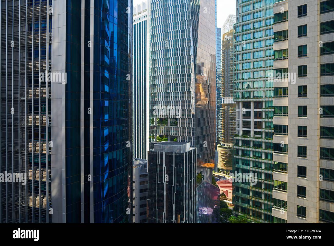 Close up of the facades of a built up business area with skyscrapers ...