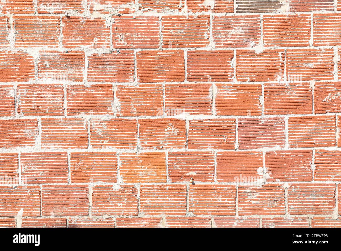 pattern of red brick wall in Texas without plaster at the rough surface ...