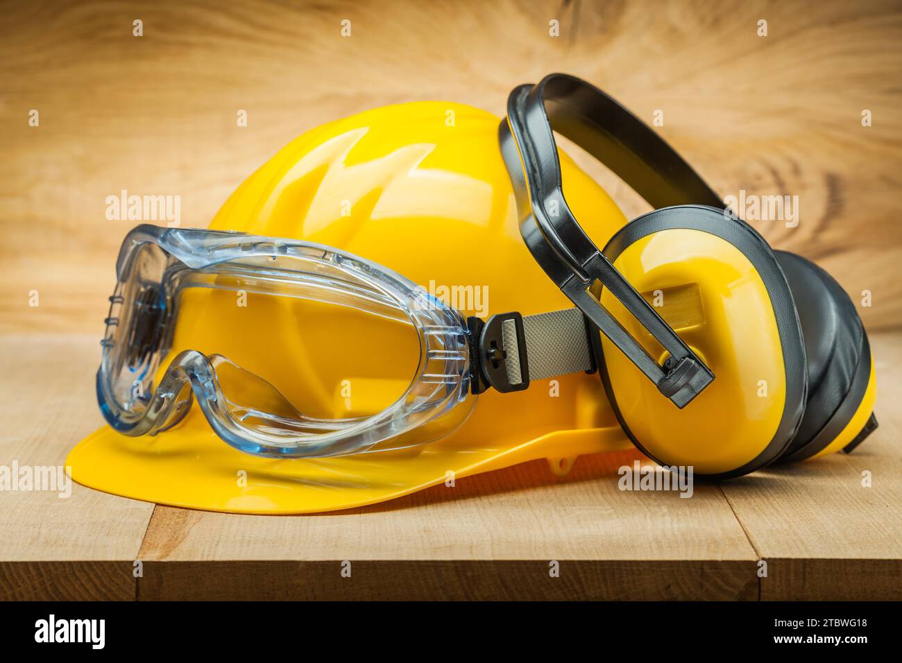 Safety of work. construction safety tools. yellow helmet blue goggles ...