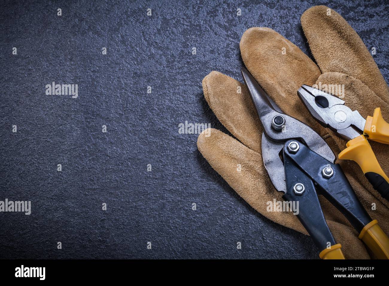 Sharp tin snips pliers leather safety glove construction concept Stock ...