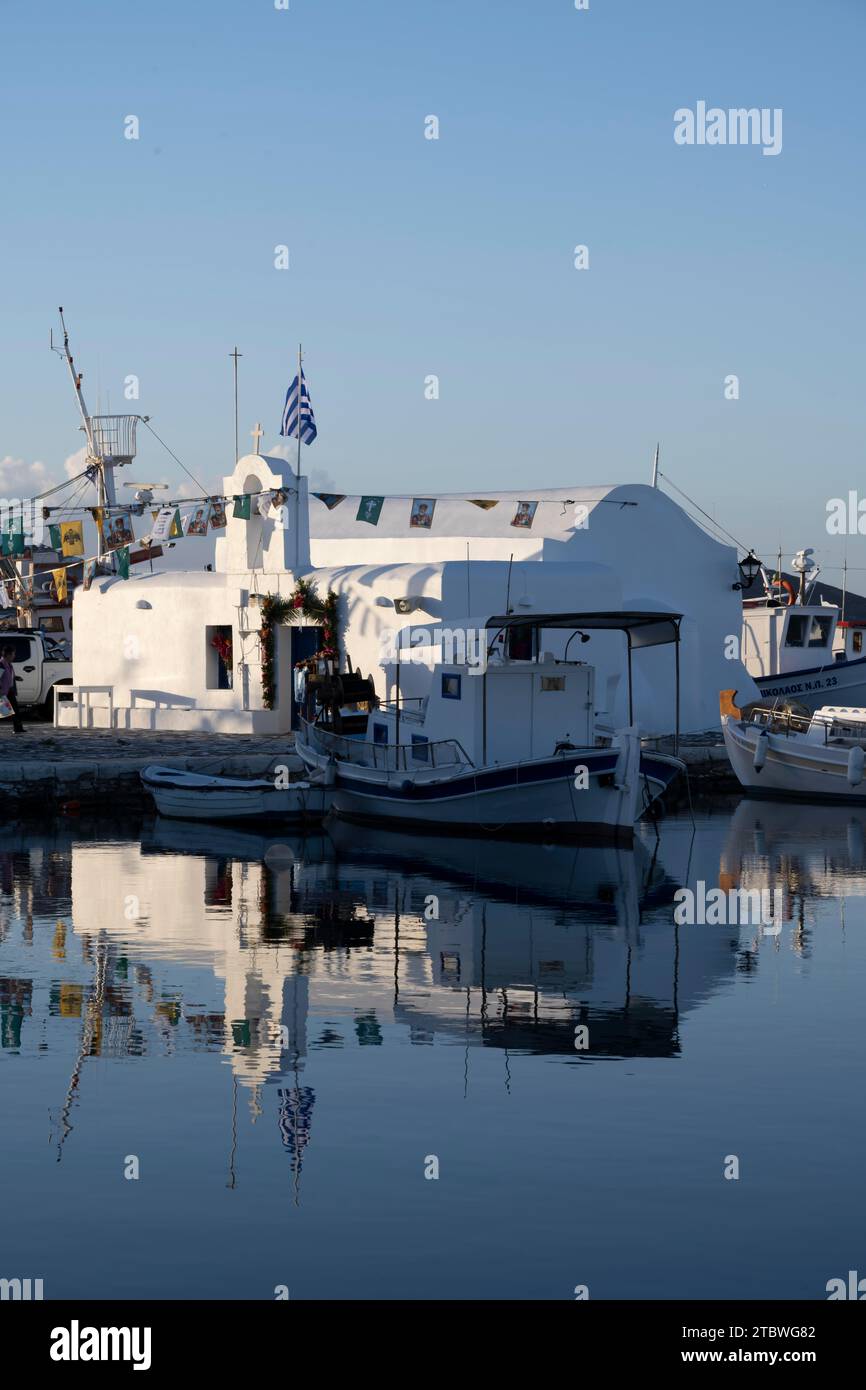 White Cycladic Greek orthodox church Agios Nikolaos, decorated with ...