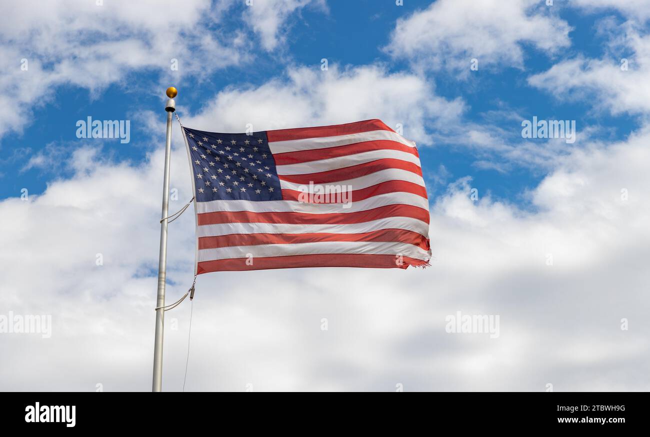 A picture of an American flag waving in the air Stock Photo - Alamy