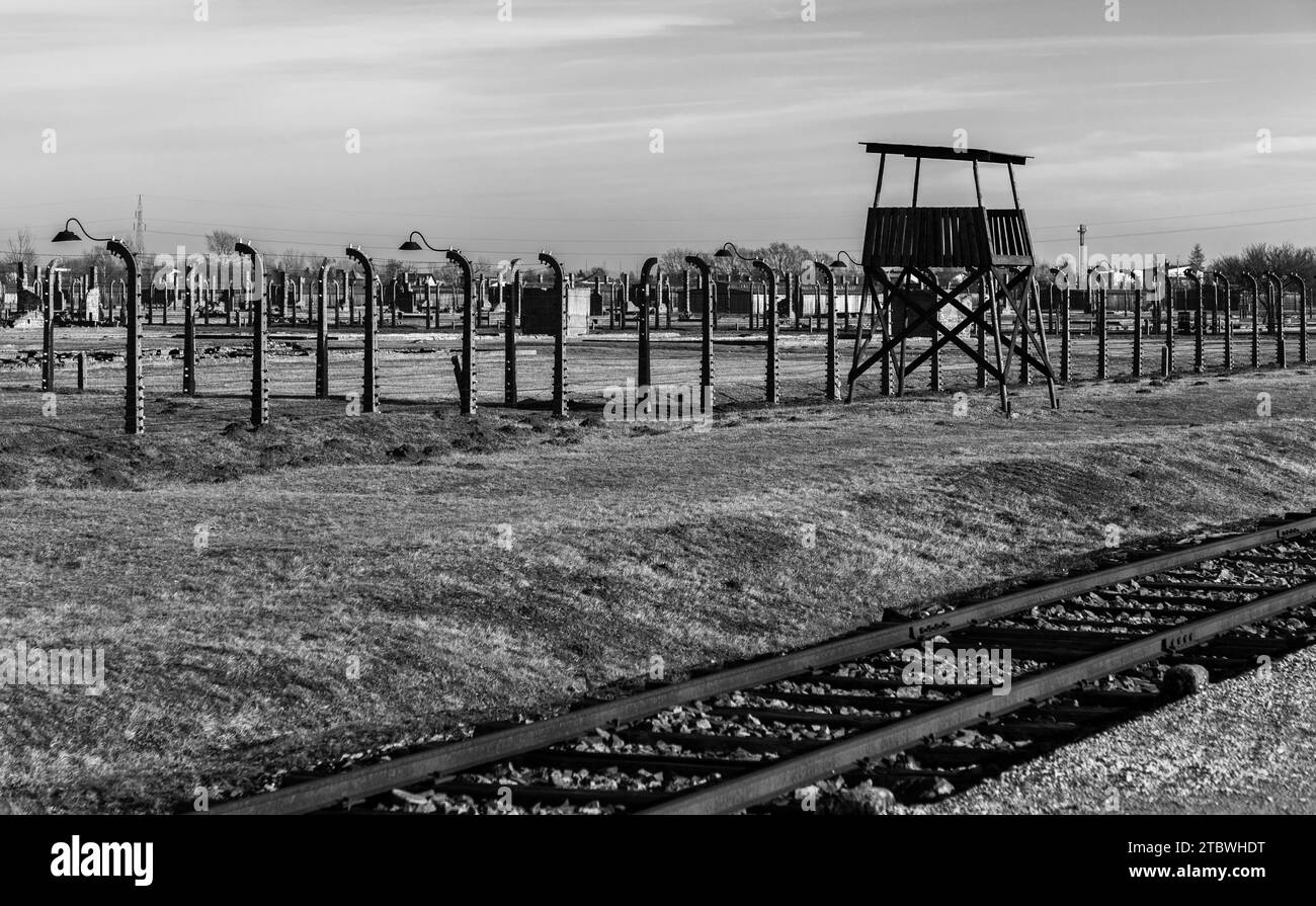 A black and white picture of a small watchtower at Auschwitz II ...