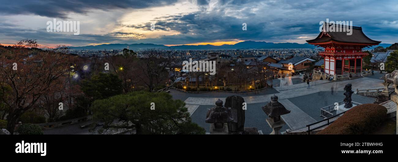 A panorama picture of the sun setting over Kyoto from the Kiyomizu-dera ...
