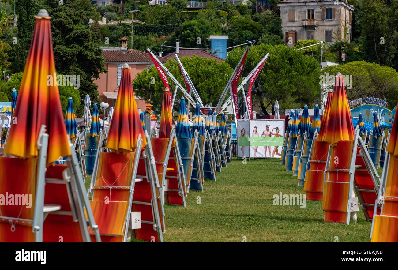A picture of folded sun loungers in the beach of Portoro Stock Photo ...
