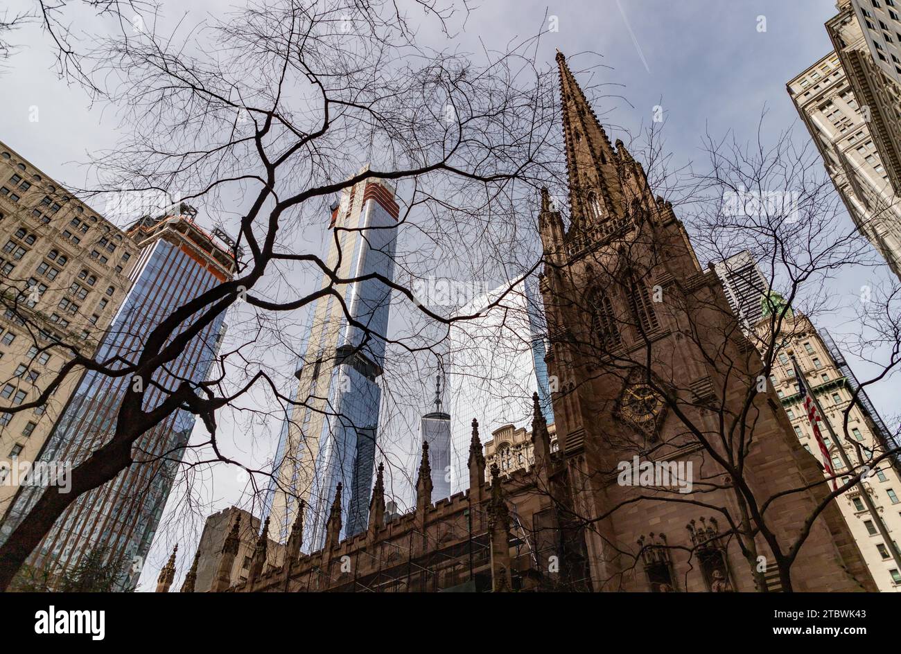 A picture of the Trinity Church overlooked by the nearby high buildings ...
