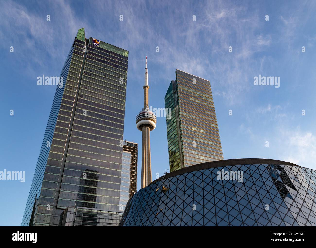 A picture of the CN Tower surrounded by other buildings Stock Photo - Alamy