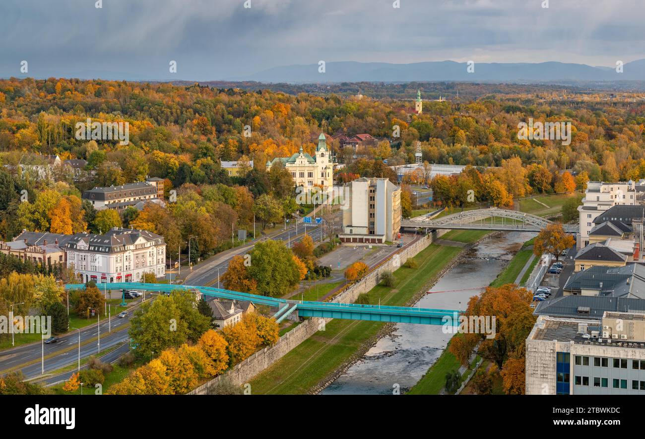 A picture of the Ostravice river and the foliage in the fall at sunset ...