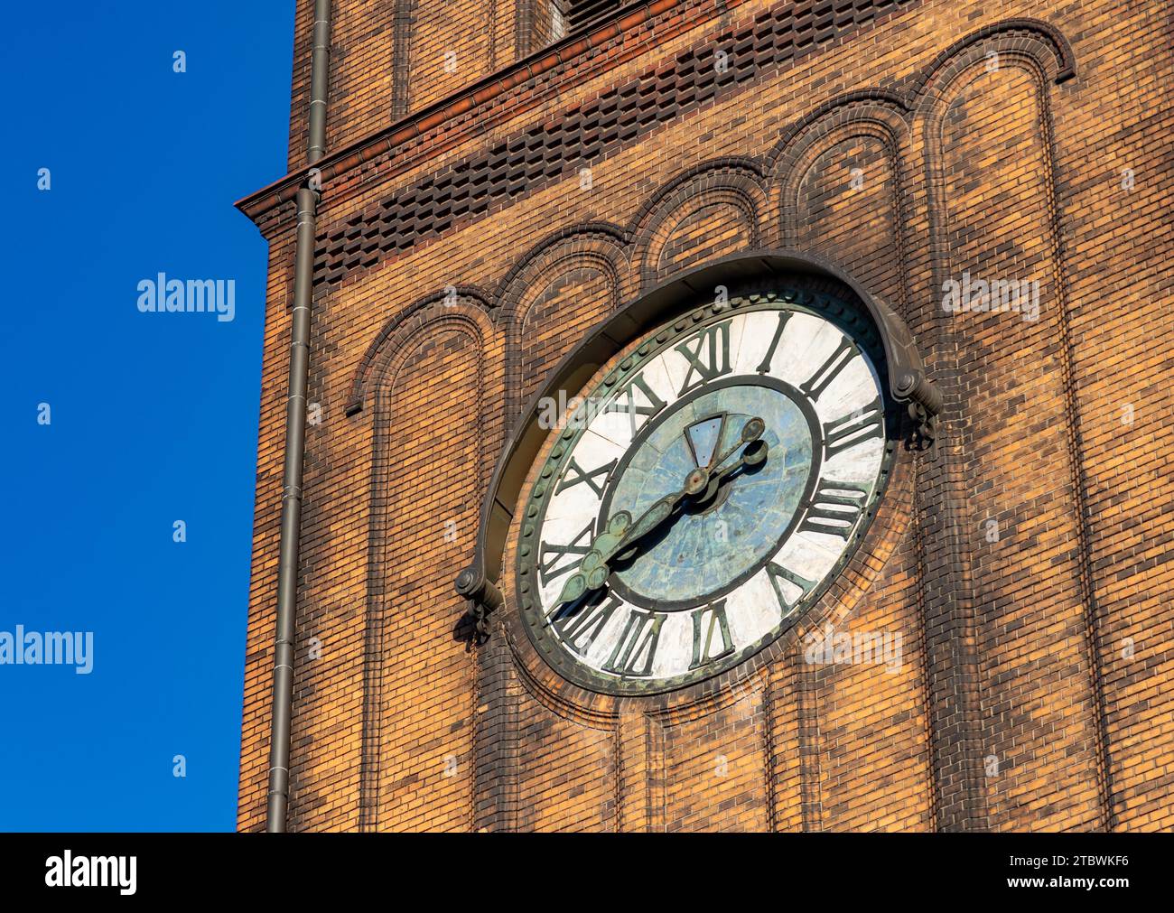 A picture of the clock on the tower of the Evangelical Church of Christ ...