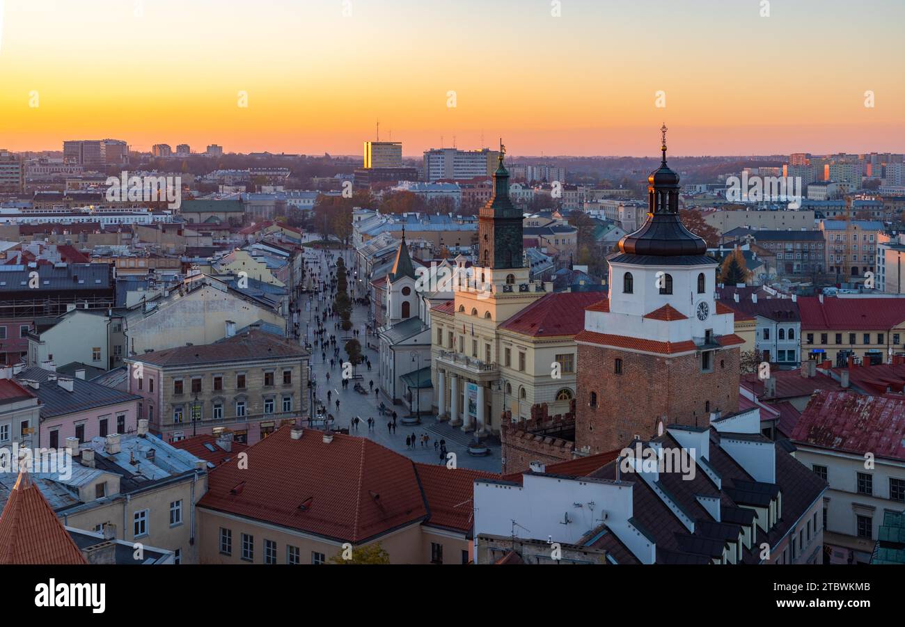 A picture of the city of Lublin at sunset, showing the Krakow Gate, the ...