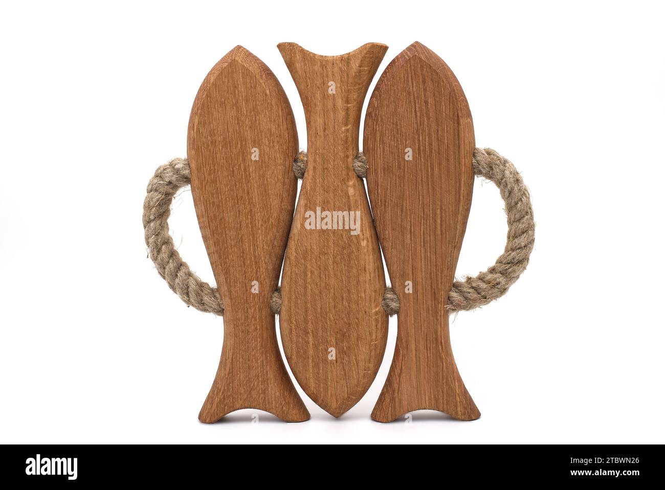 Fish shaped natural wood serving tray with rope handles isolated on ...