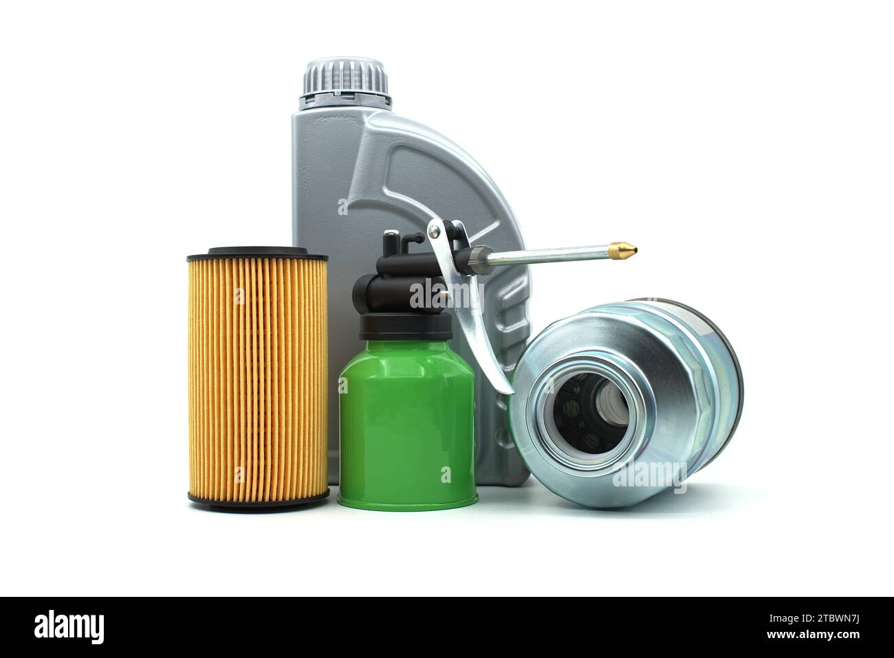 Motor oil, hand oiler and oil filters isolated on a white background ...