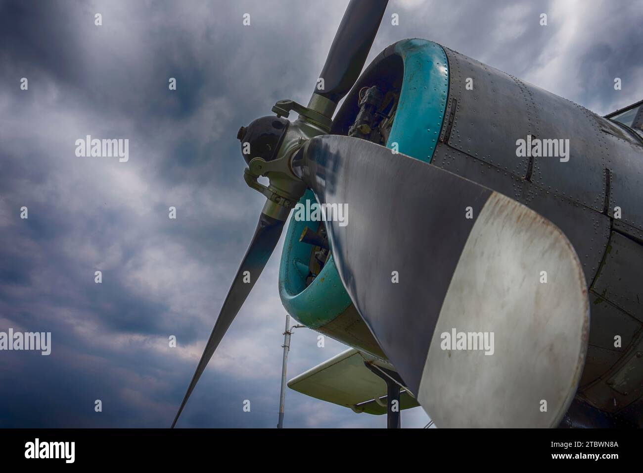 Propellers on a single engine vintage biplane viewed from the side ...