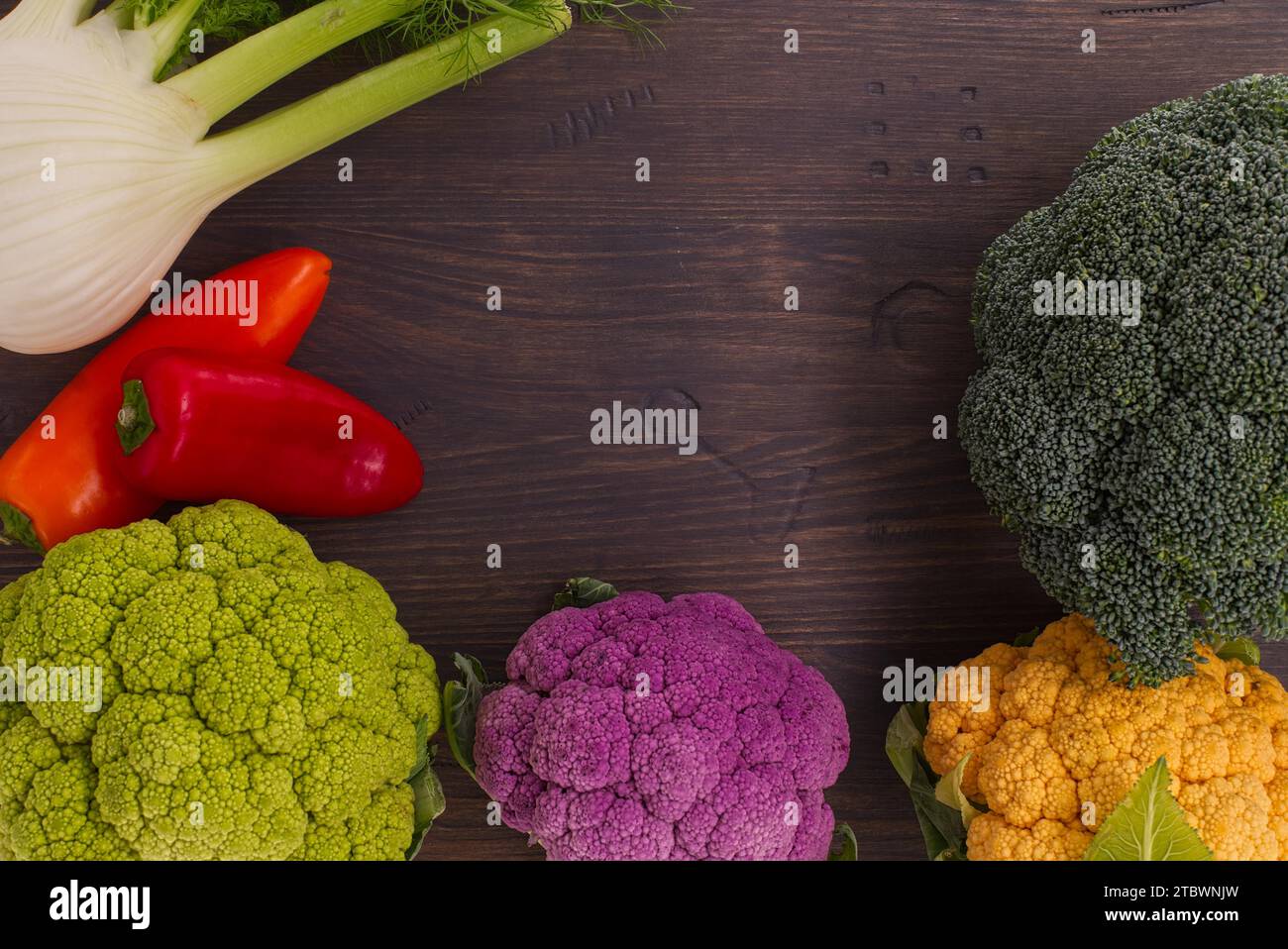 Rustic border of healthy fresh vegetables over wood with copyspace ...