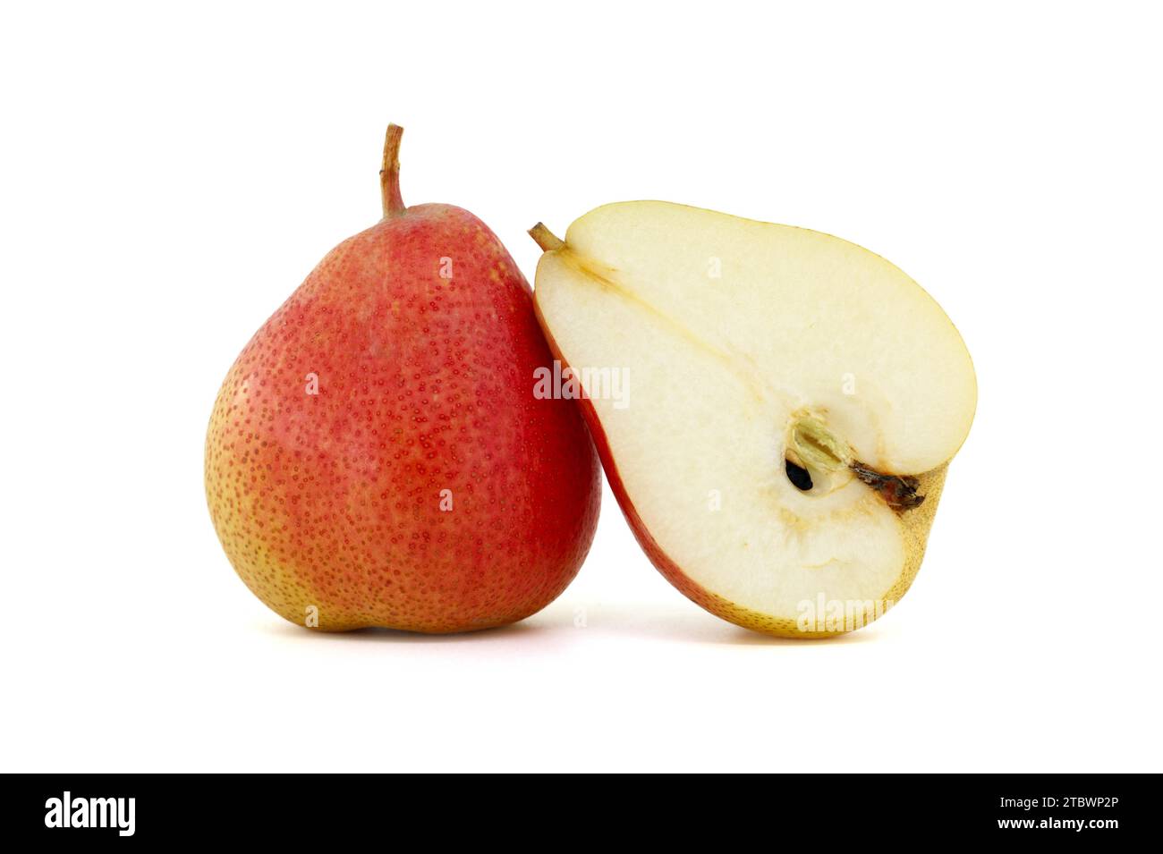 Fresh whole and half cut pear isolated on white background Stock Photo ...