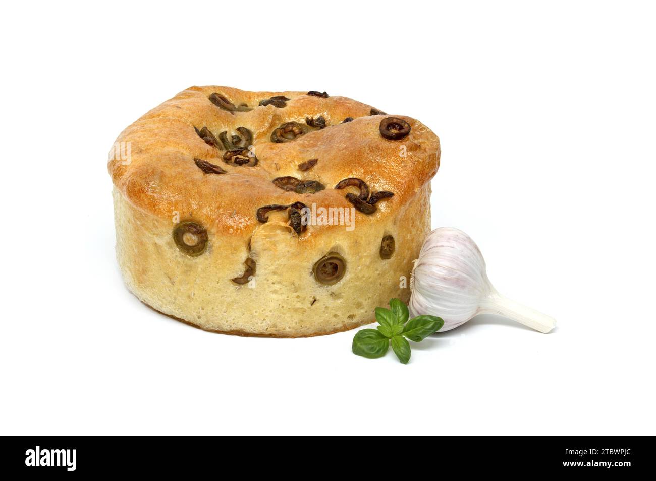 Round focaccia bread with olives, garlic and basil sprig isolated on ...