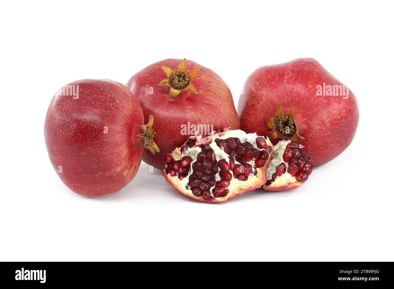 Red juice pomegranate fruits isolated on white background Stock Photo ...