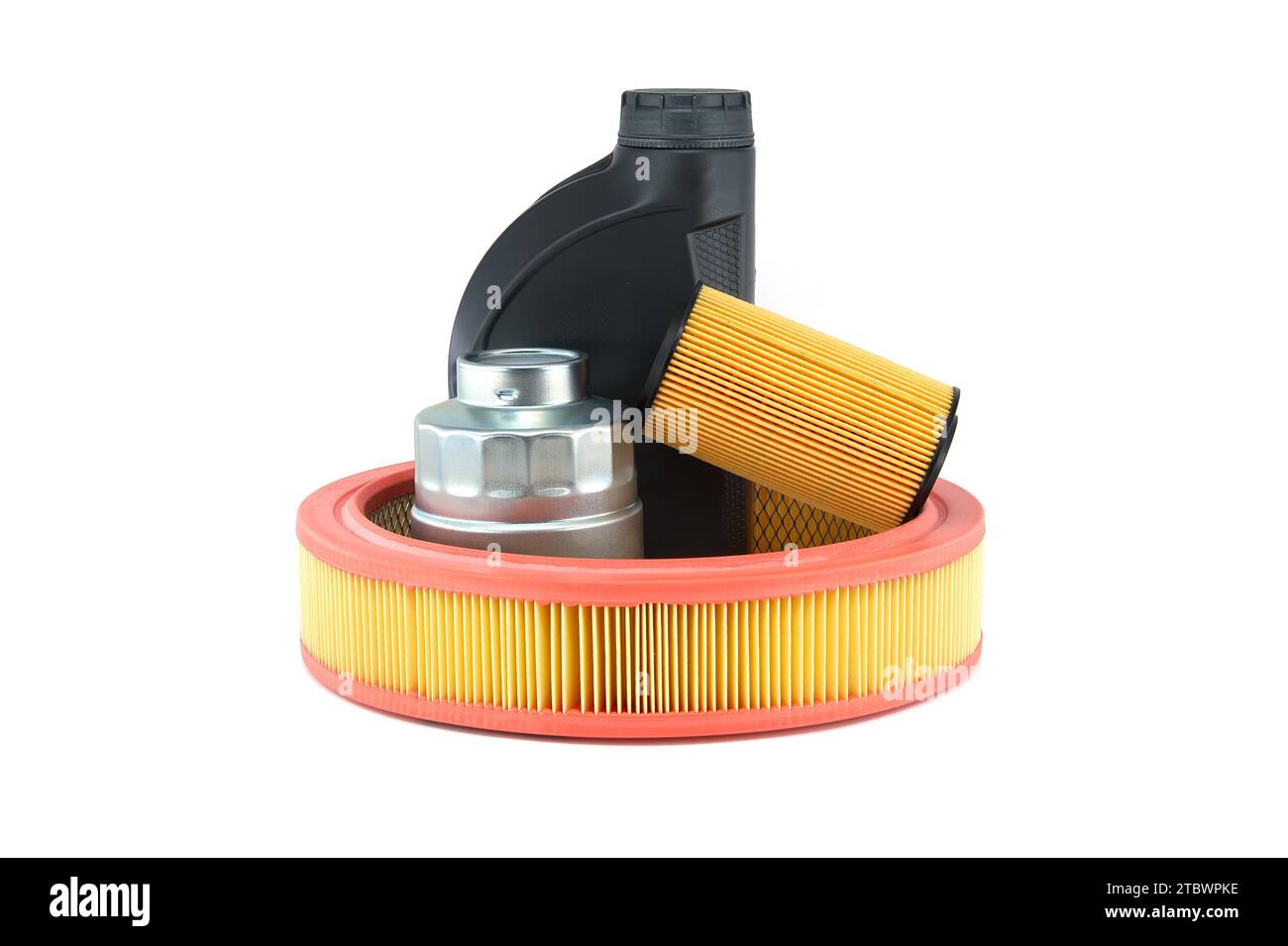 Motor oil, fuel and air filters near motor oil can isolated on a white ...