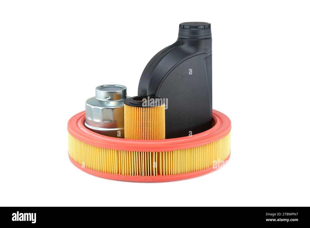 Car oil, fuel and air filters near motor oil can isolated on a white ...