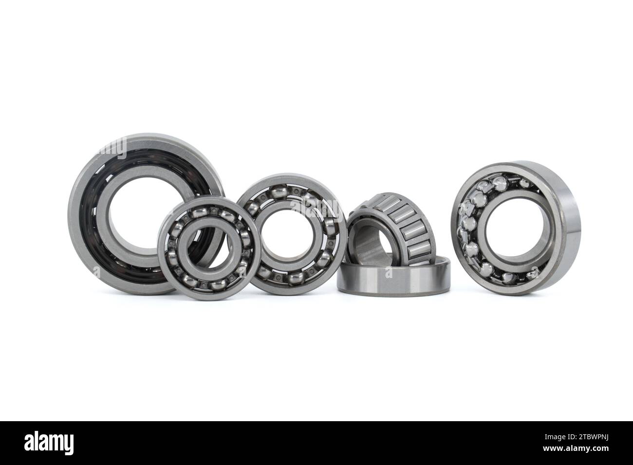 Group of various ball and roller bearings on white background. Spare ...