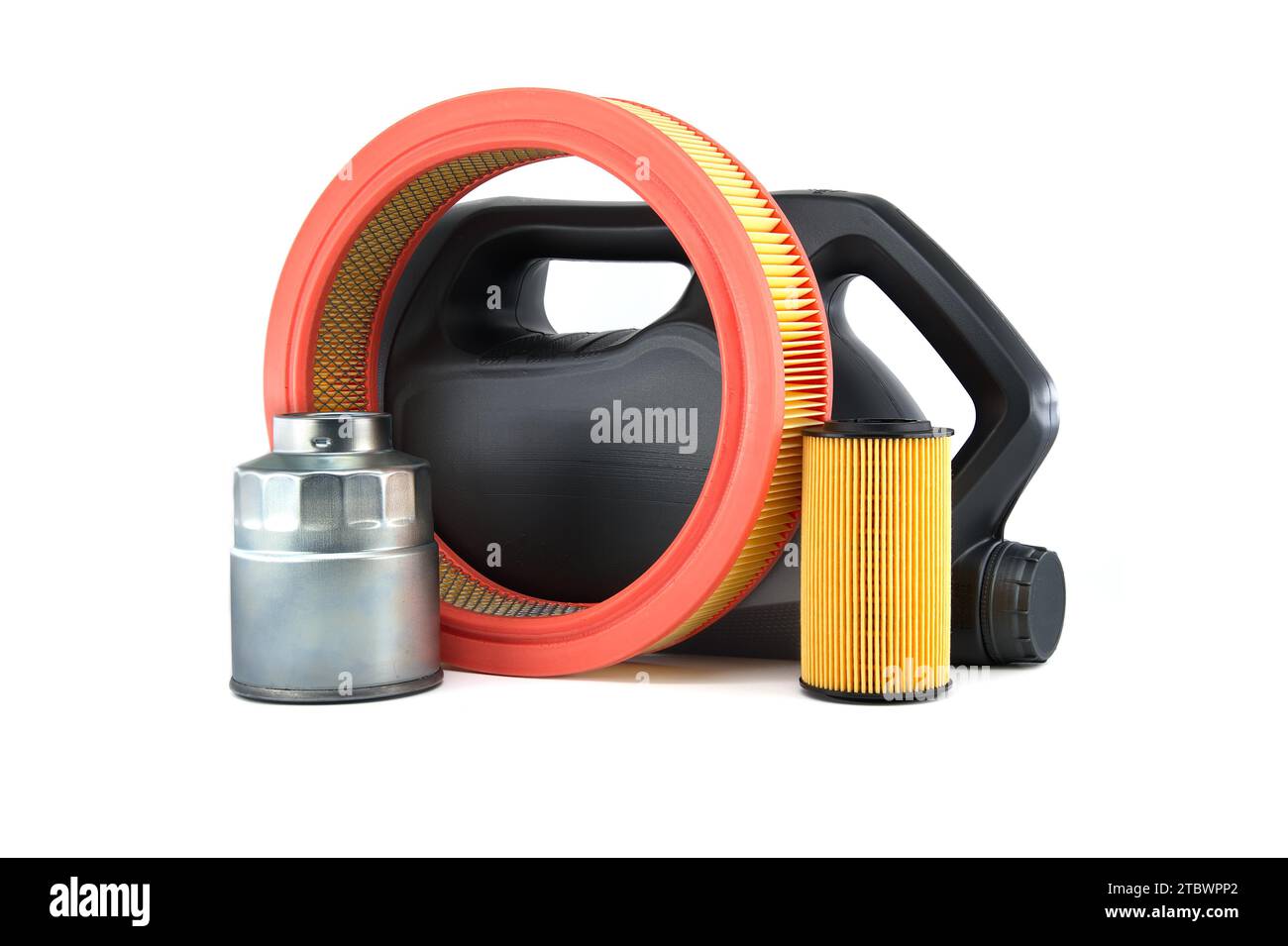 Motor oil, fuel and air filters near motor oil can isolated on a white ...