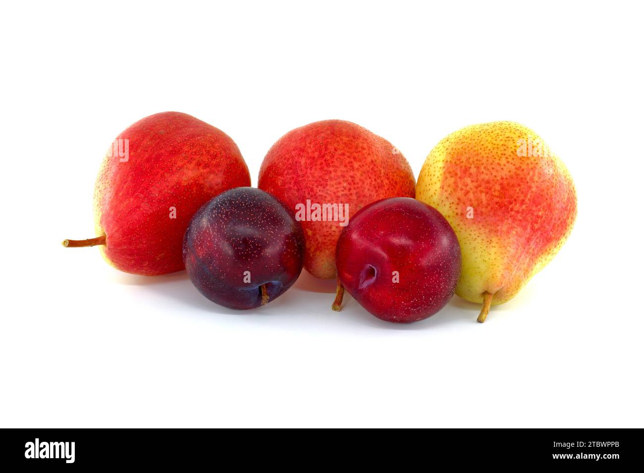 Three fresh ripe pears and plums isolated on white background Stock ...