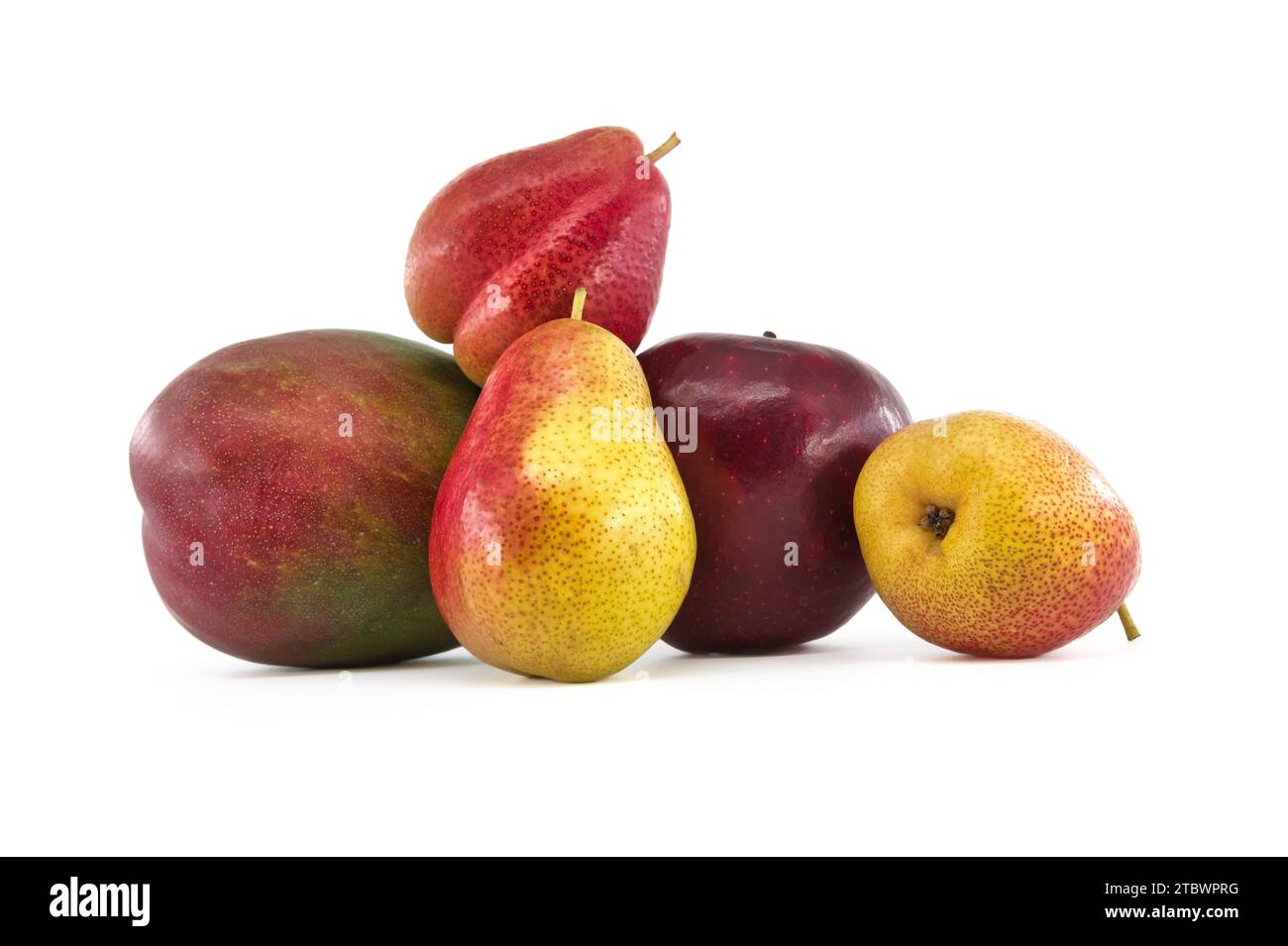 Assortment of fresh healthy fruits including mango, pears and apple ...