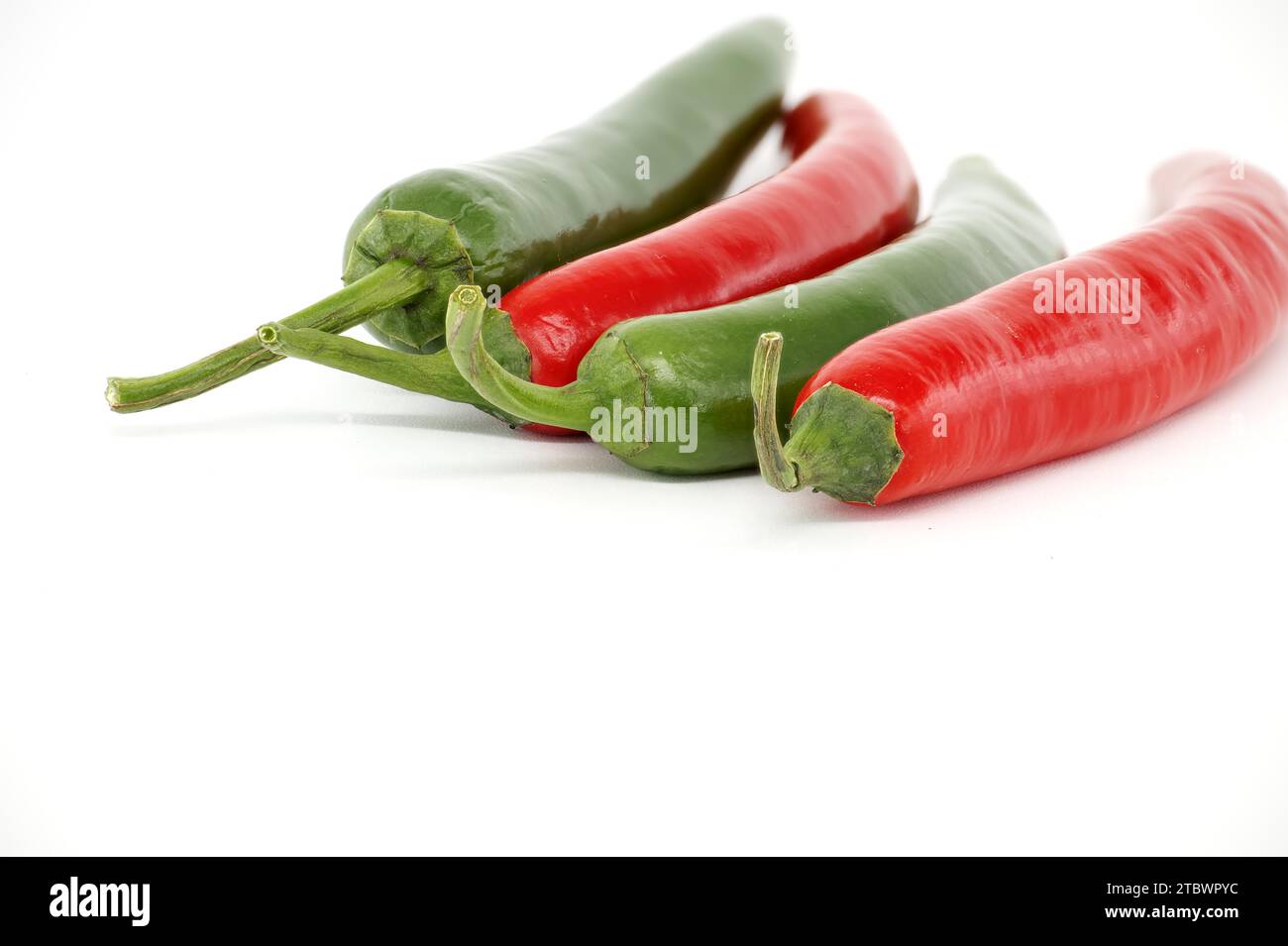 Red and green hot chili peppers isolated on white background Stock ...