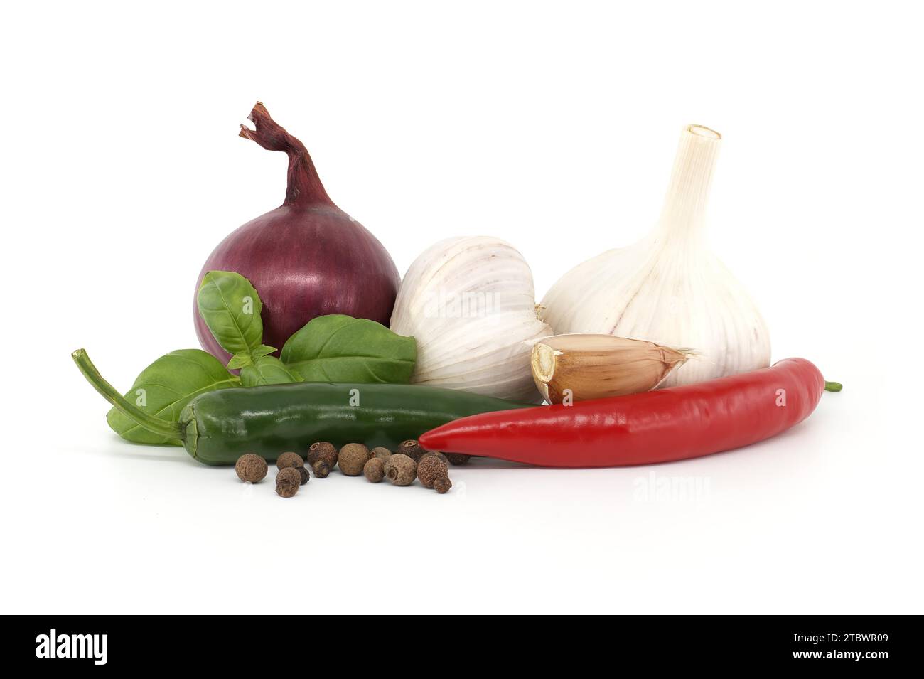Spices and flavoring theme still life with red onion, chili pepper ...