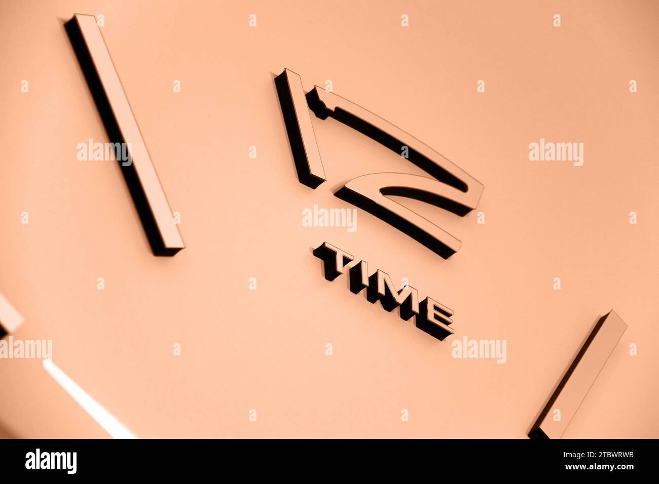 Image with big clocks. Image toned in Peach Fuzz color of the year 2024. New Fashion colour. Top ...