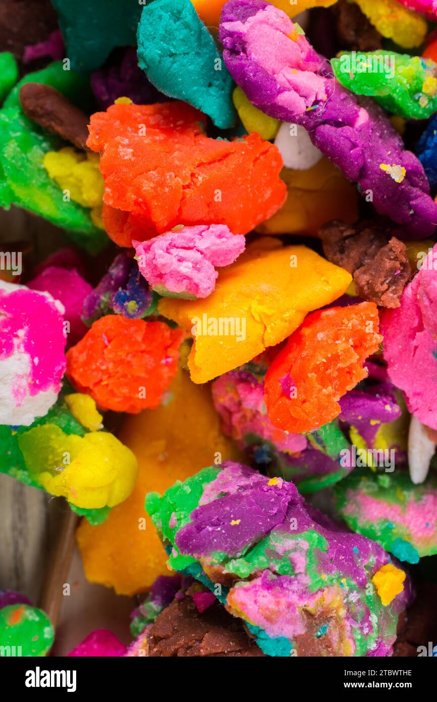 Dry colorful play dough in smal pieces Stock Photo - Alamy