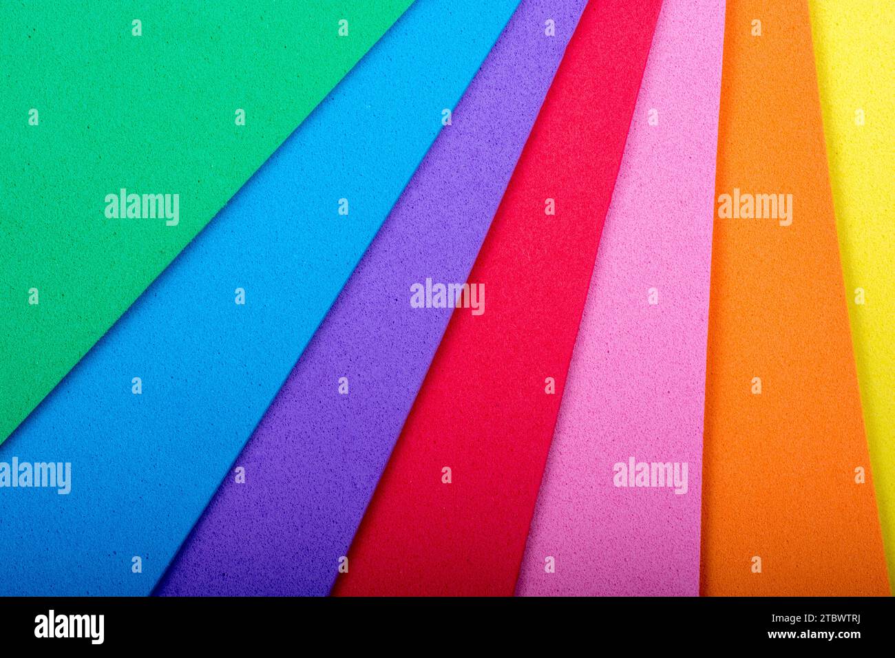 Colorful objects make mixed multi color background Stock Photo - Alamy