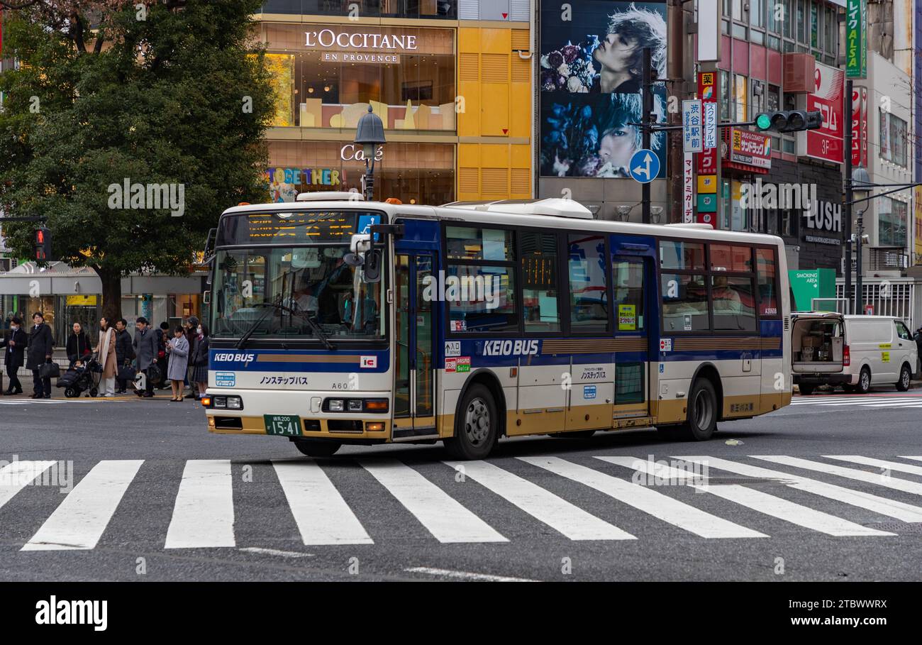 A picture of a bus passing through the Shibuya Crossing, in Tokyo Stock ...