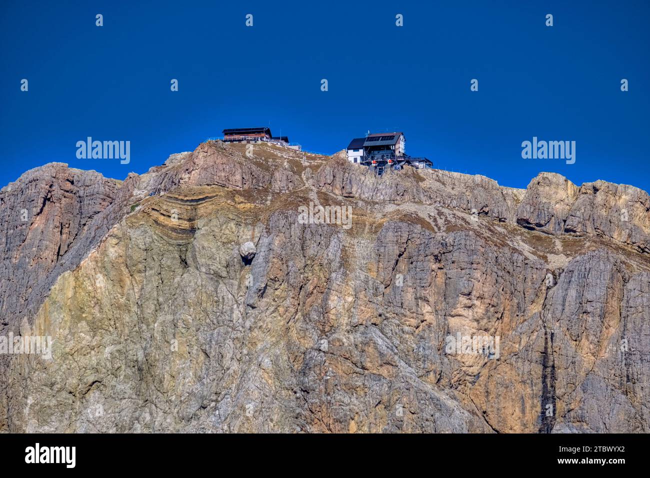 The summit of the rock formation Lagazui and the mountain hut Rifugio ...
