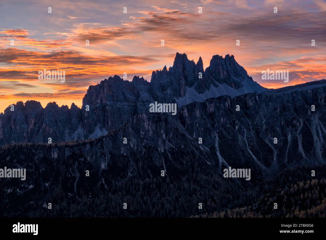 The rock formation Cima Ambrizzola at sunrise in autumn, seen from the ...
