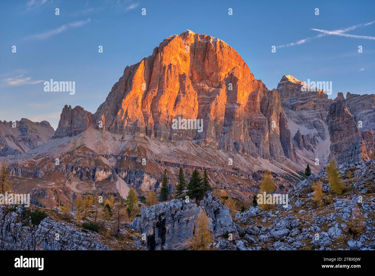 The rock formation Tofana, illuminated at sunrise, seen from the rock ...