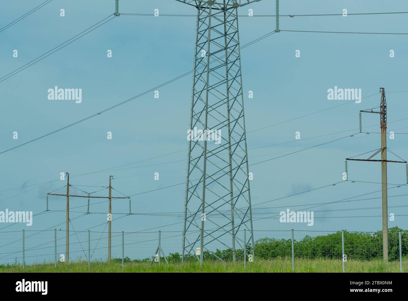 High voltage towers with sky background. Power line support with wires ...