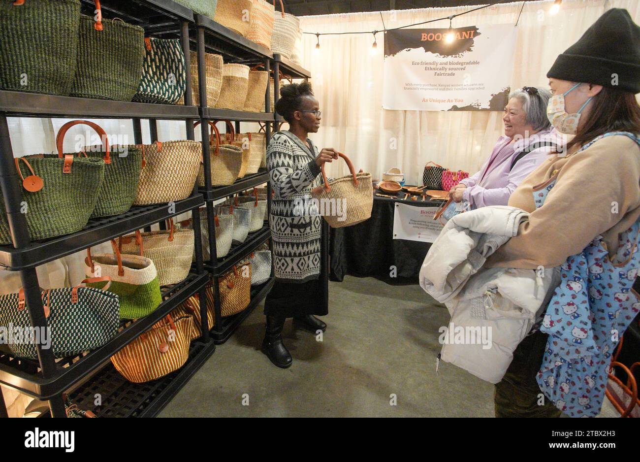 Vancouver, Canada. 8th Dec, 2023. A vendor displays her handmade bag ...