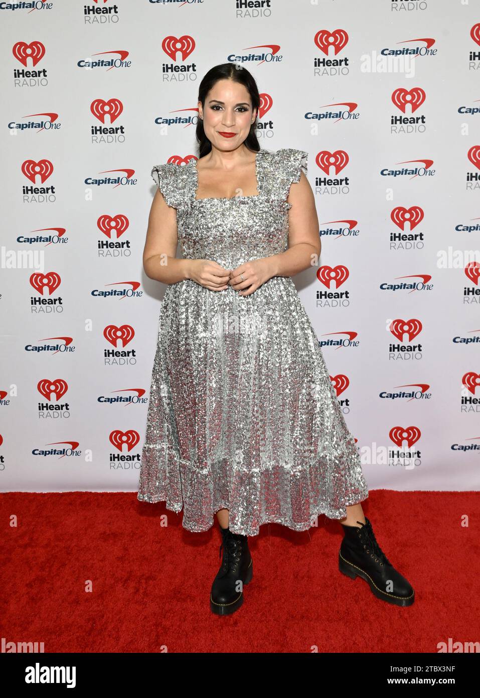 Gina Naomi Baez arrives at the iHeartRadio Jingle Ball on Friday, Dec ...