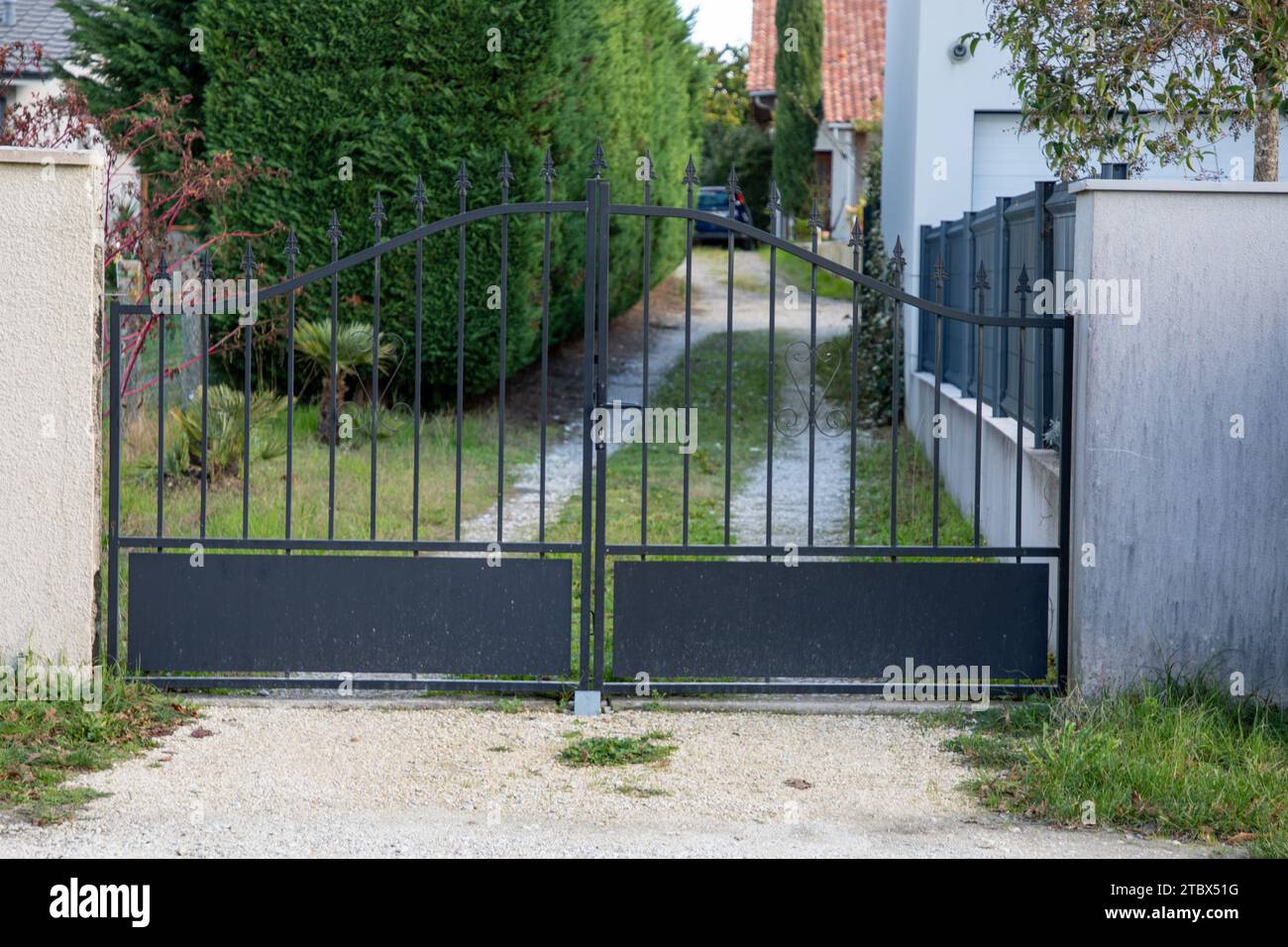 Grey and black entrance gates hi-res stock photography and images - Alamy