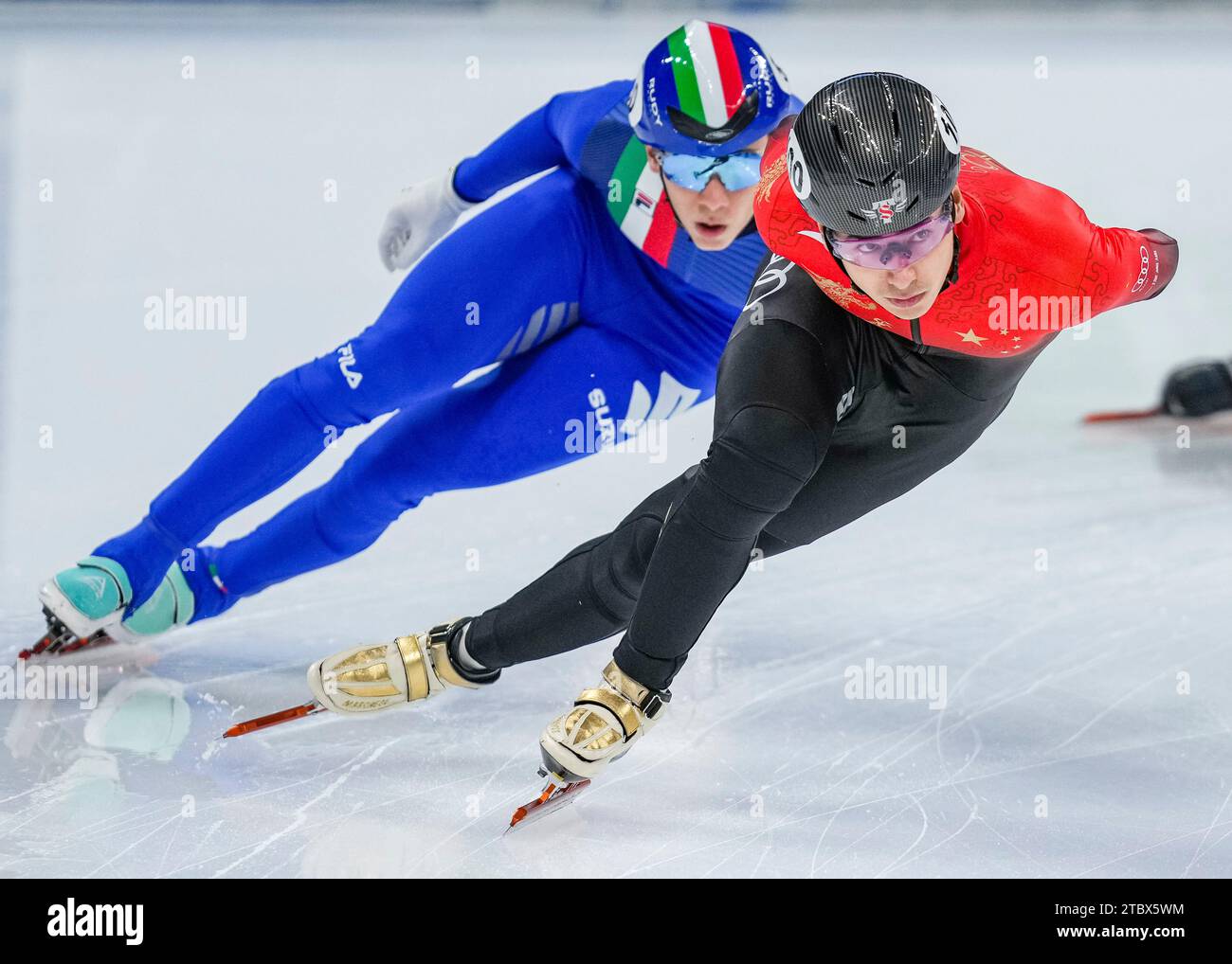 Beijing, China. 9th Dec, 2023. Liu Shaoang (R) of China competes during ...
