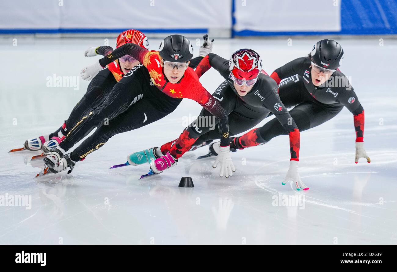 Beijing, China. 9th Dec, 2023. Fan Kexin (2nd L) of China competes ...