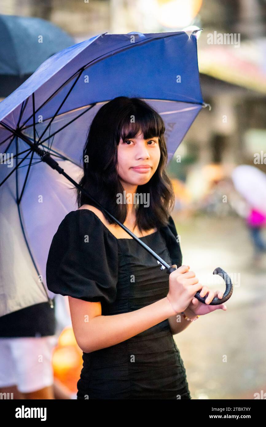 Asian girl in the rain hi-res stock photography and images - Alamy