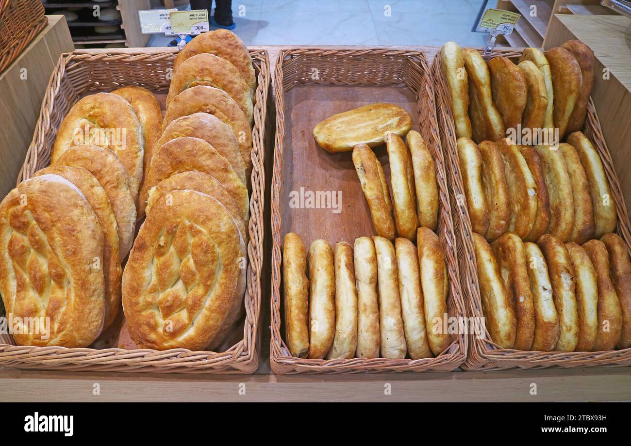Baskets of Armenian traditional breads for sale in a local bakery shop ...