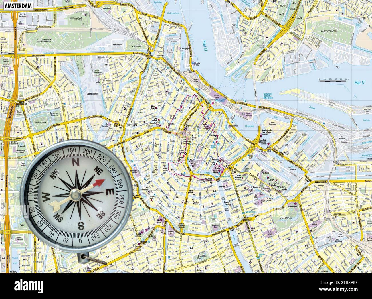 Aged compass on map of Amsterdam as background Stock Photo - Alamy